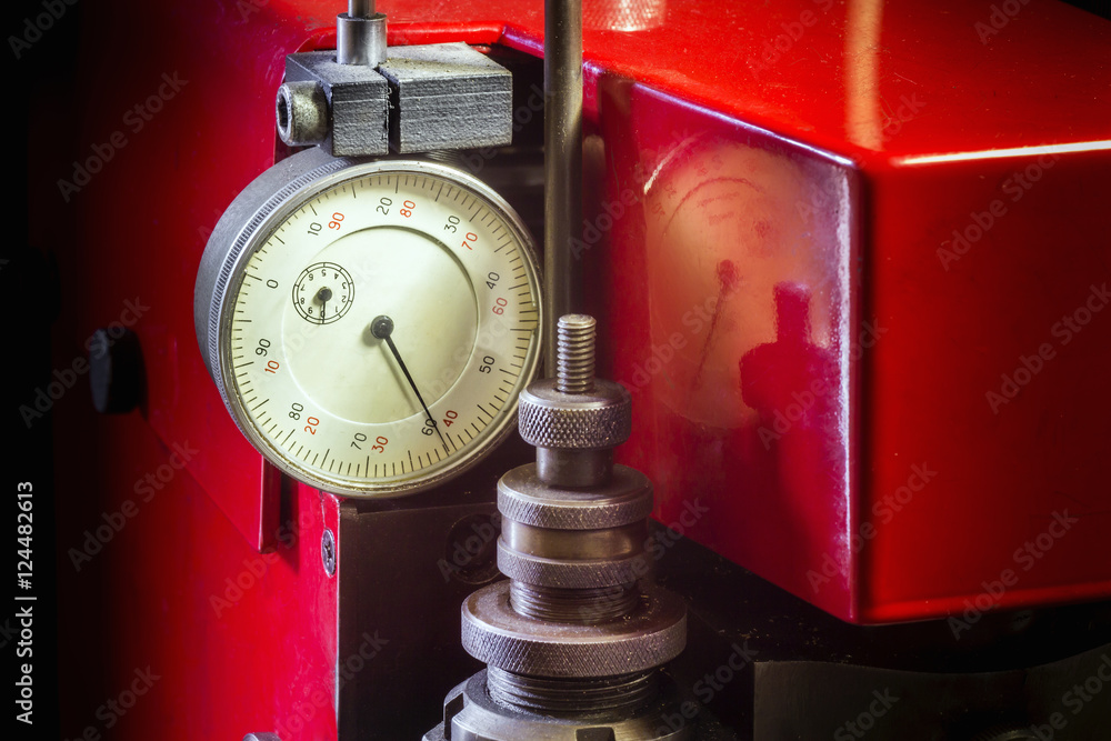 Dial indicator distance meter on a red key copying machine Stock Photo ...