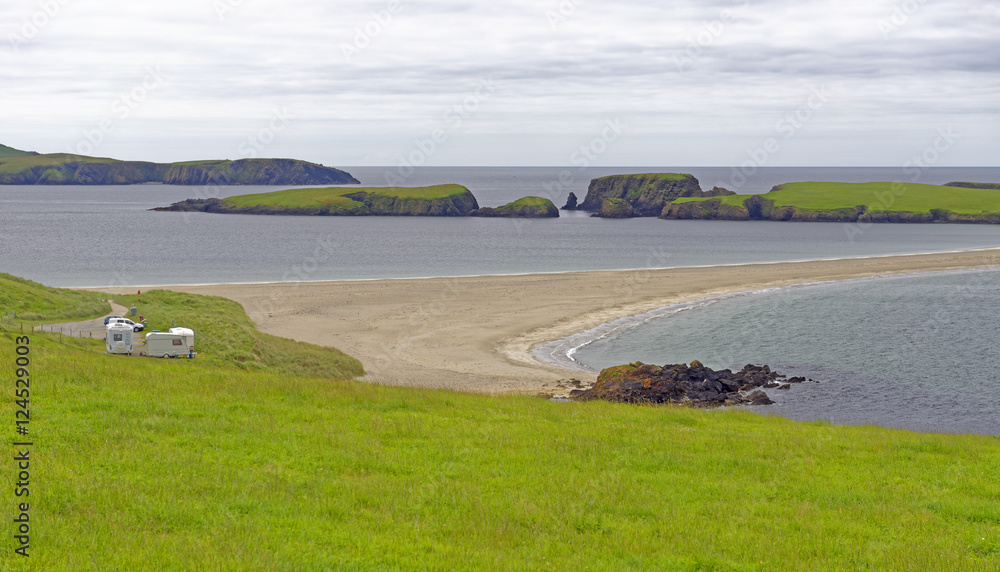 Natural sand causeway (tombolo) connecting St. Ninian's Isle to the ...