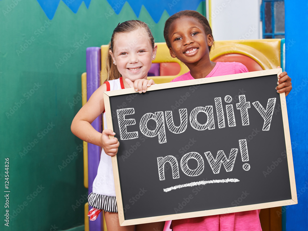 Children demanding "Equality now!" on blackboard Stock Photo | Adobe Stock