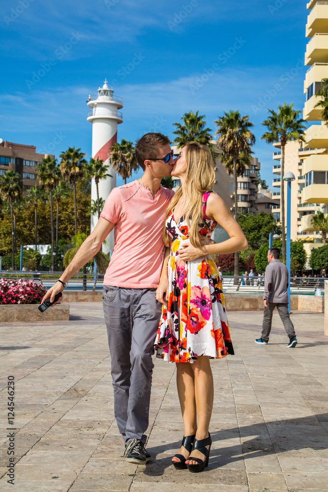 Young romantic couple boy and girl kissing on the street in Marb Stock Photo | Adobe Stock