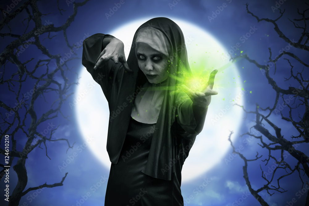 Scary asian nun casting spell Stock Photo | Adobe Stock
