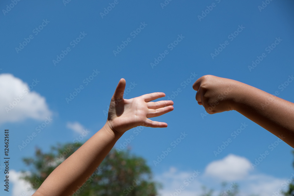 roshambo sign with a bright sky background, Rock paper scissors Image ...