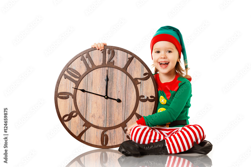 Foto de Christmas concept. Little Elf with clock isolated on white do ...