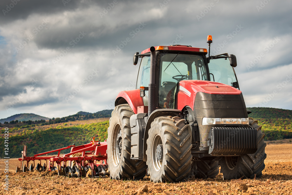 Red tractor. Stock Photo | Adobe Stock