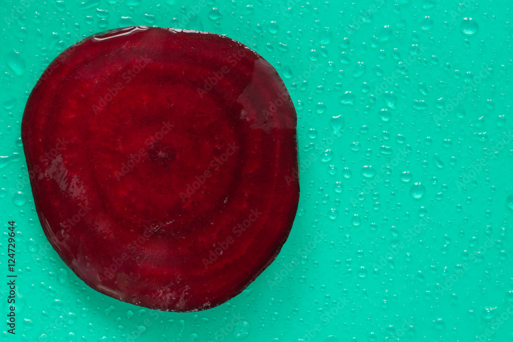Beetroot. Cross section. Water drops. Green background. Top view Stock ...