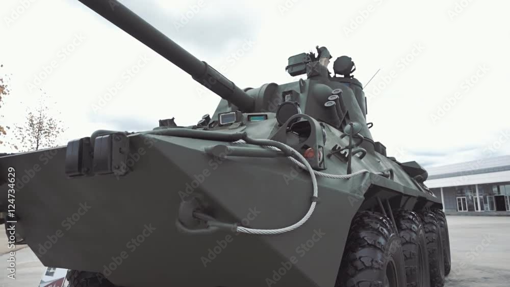 Fighting wheeled floating armored vehicle, equipped with weapons ...