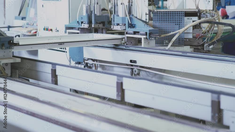 Welding of PVC profiles. Welding of PVC window profile. Welding machine ...