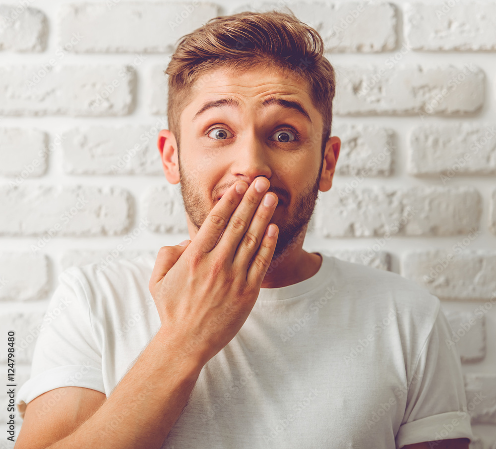 Handsome emotional guy Stock-Foto | Adobe Stock
