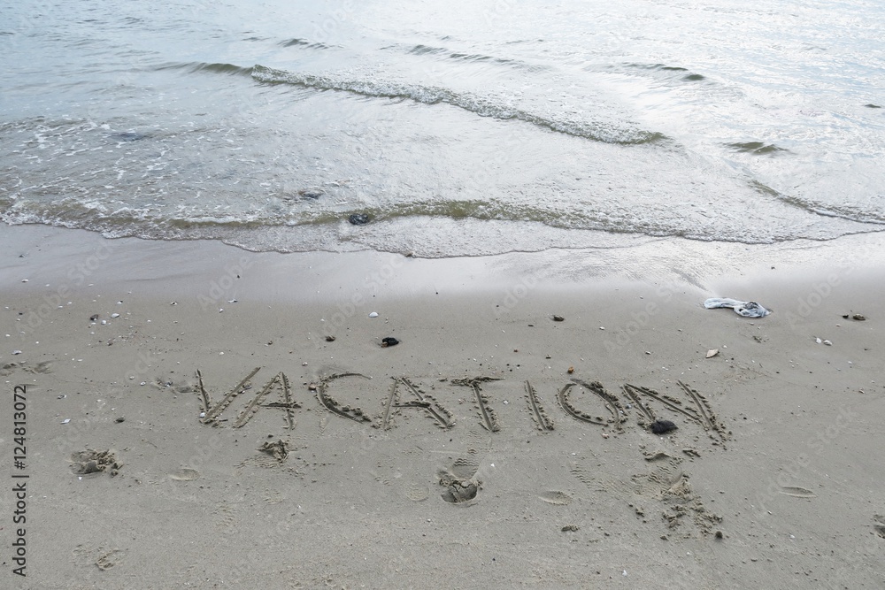 Writing on sand. Words on sand. Summer word on sand beach. Sandy beach ...