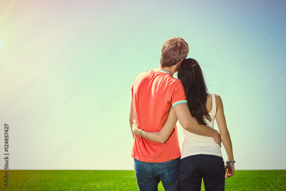 Back view of young couple looking into the distance Stock Photo | Adobe ...