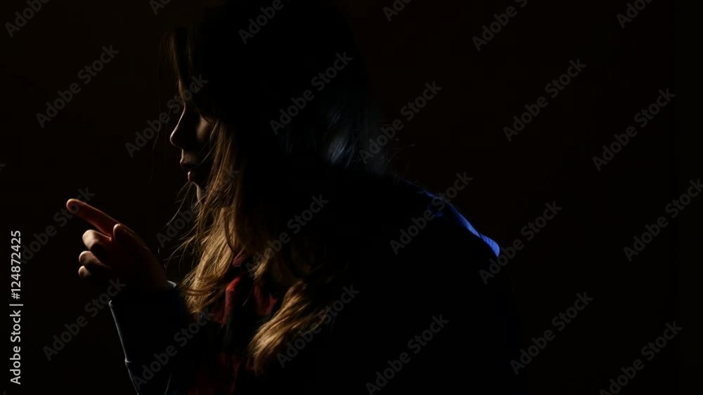 Teen girl is Screaming in dark room. 4K UHD Stock Video | Adobe Stock