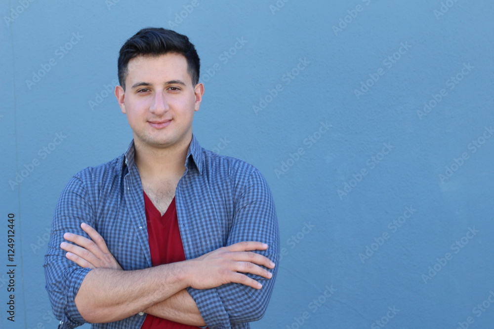 Portrait of a normal boy over blue background / Natural looking young ...