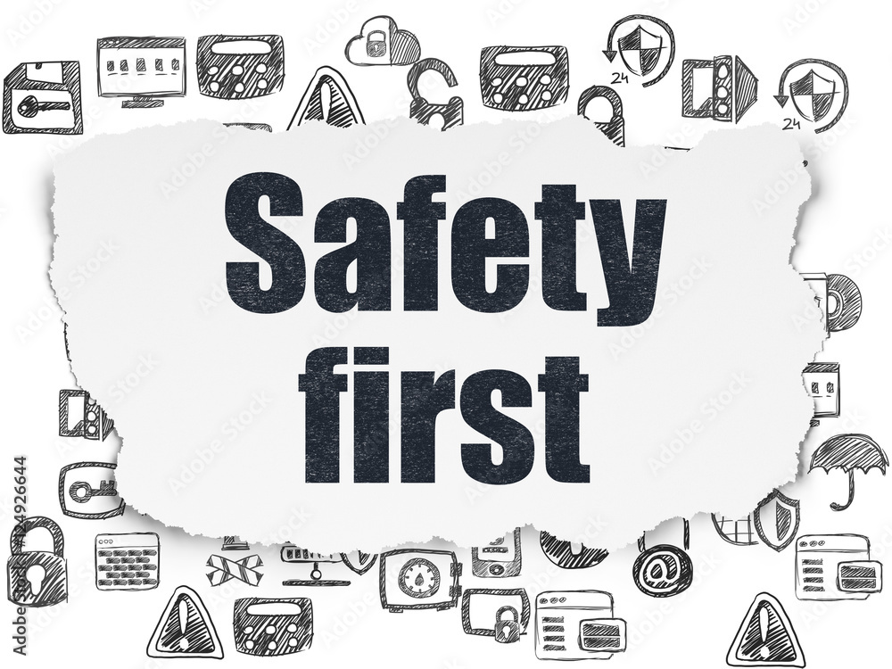 Security concept: Safety First on Torn Paper background Stock ...