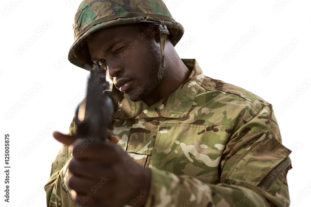 Soldier aiming with a rifle Stock Photo | Adobe Stock
