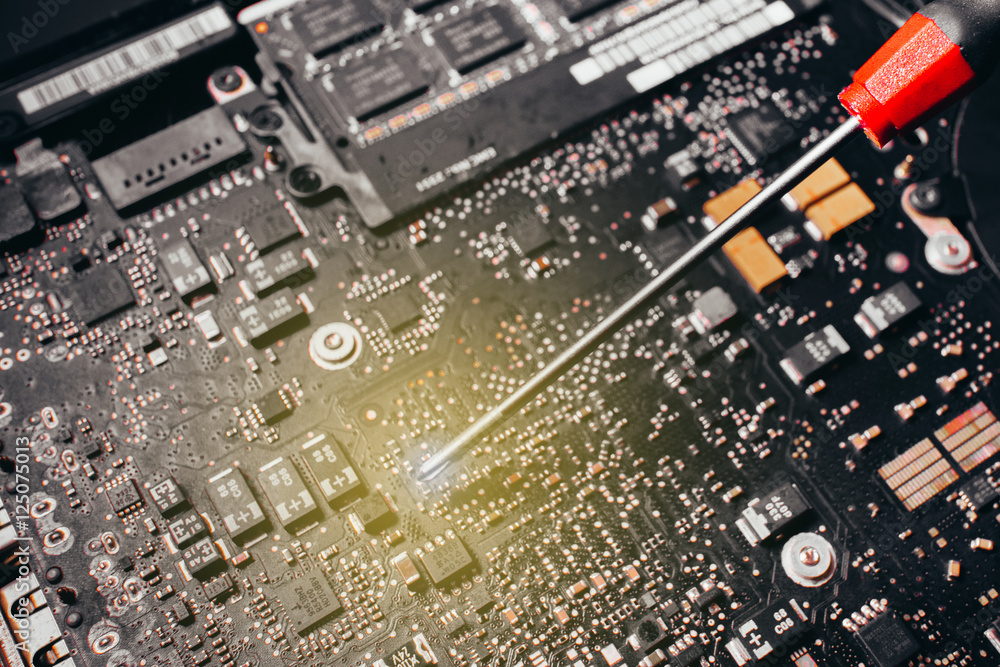 Screwdriver and Electronic board repairs on black background,Repair ...