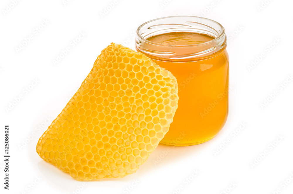 Glas Honig mit Wabe Stock-Foto | Adobe Stock