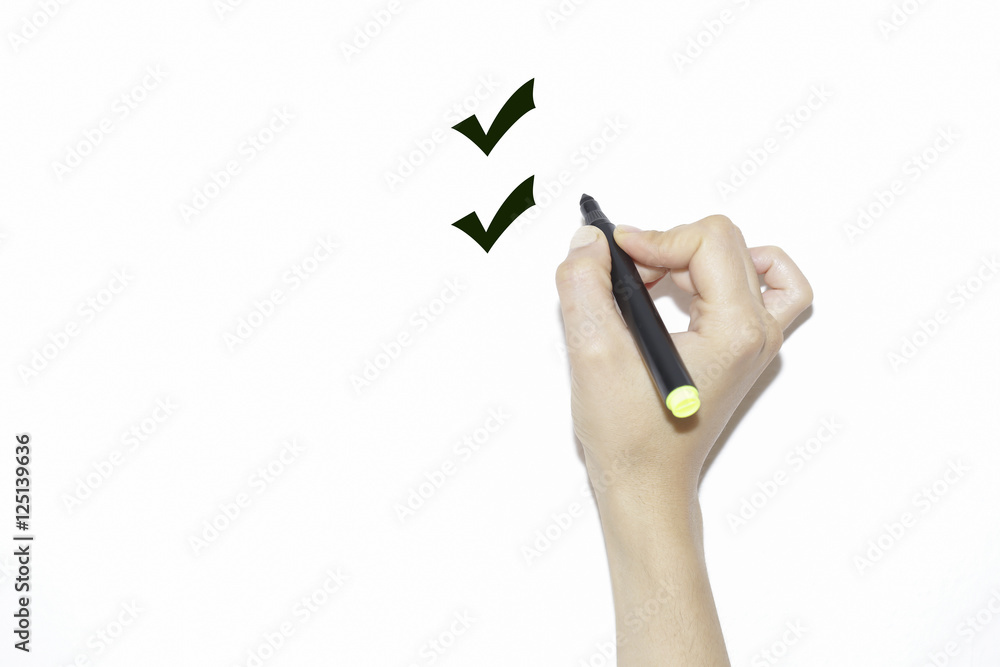 Woman hand with marker drawing two black check mark on white background ...