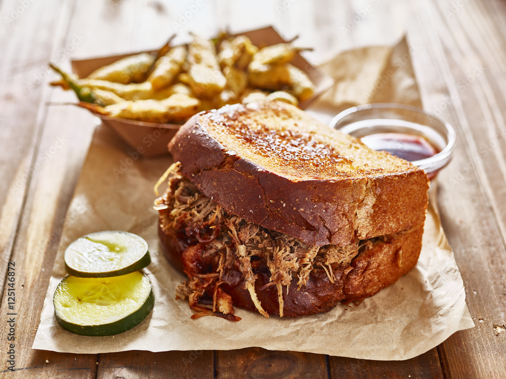 barbecue pulled pork sandwich with fried okra Stock Photo | Adobe Stock