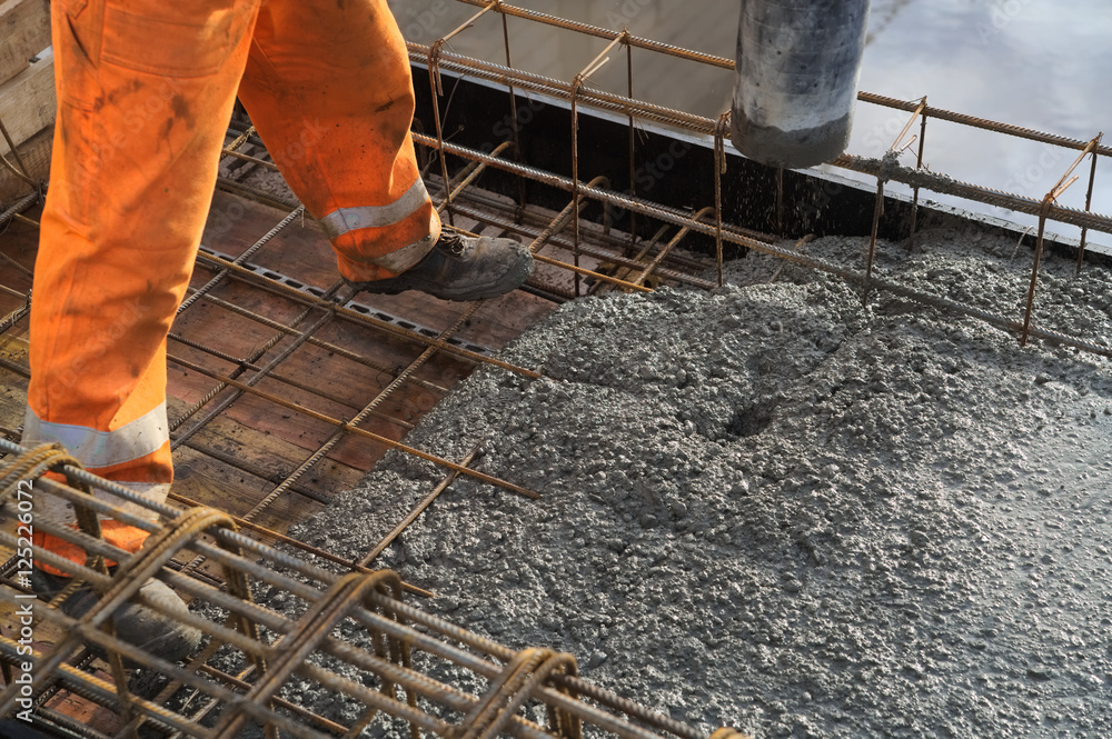 Concreting of slab pouring concrete engineering construction with rebar ...