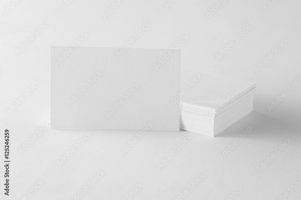 Mockup of single business card at cards stack on design paper Stock ...