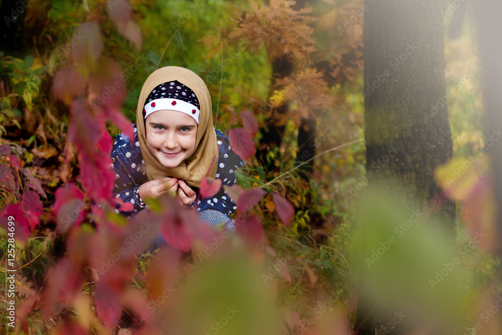 Little muslim girl in hijab - outdoor photo Stock Photo | Adobe Stock