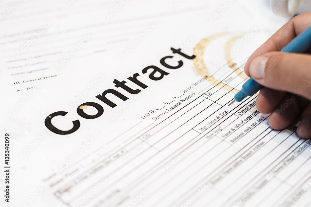 Dirty contract papers with cracker and coffee trace. Close-up of ...