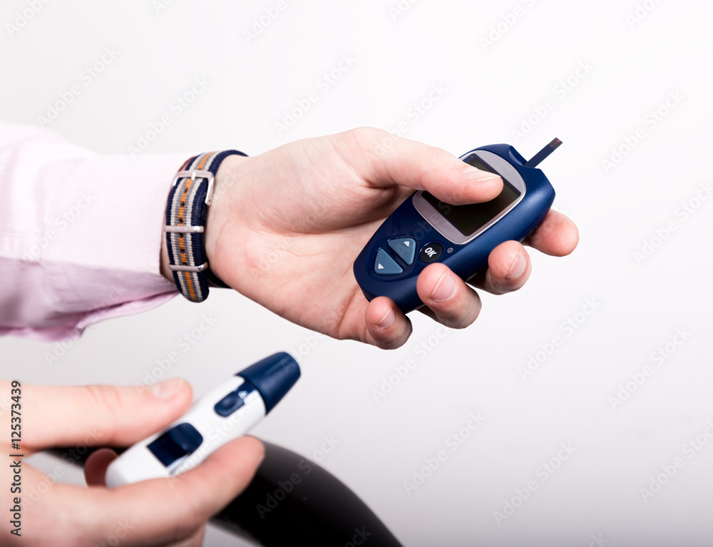 Measuring glucose level blood test using ultra mini glucometer and ...