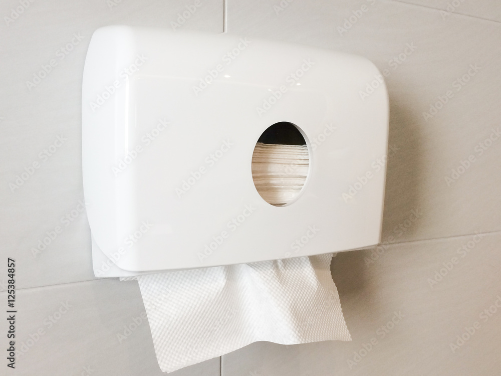 White box of tissues on wall in toilet (restroom). Stock Photo | Adobe ...