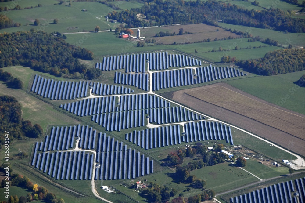 Aerial view of Photovoltaic solar panels on a Energy Solar farm in the ...