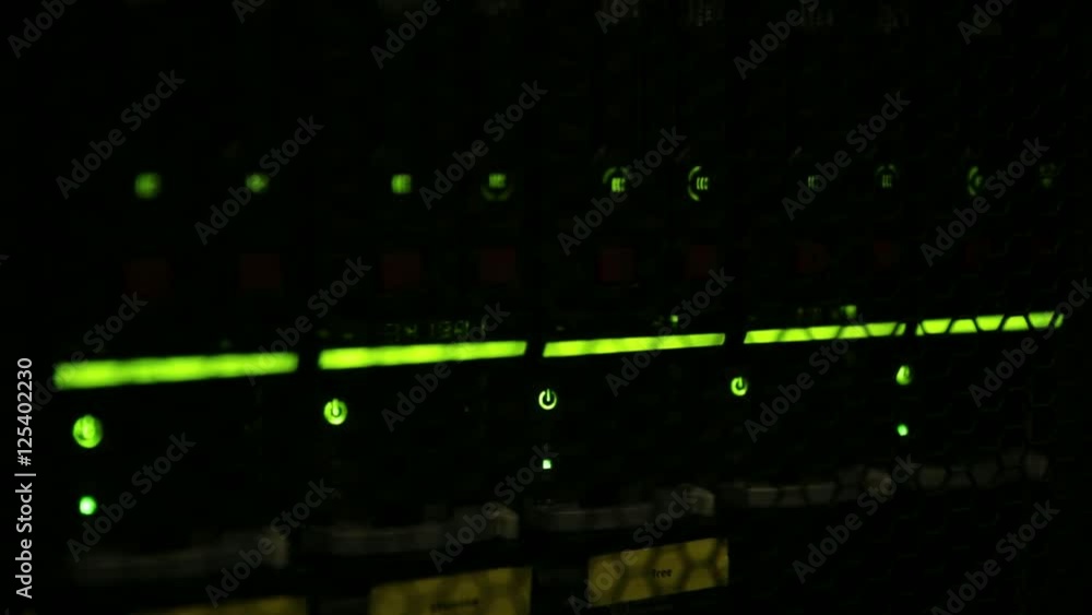 Rack focus on server lights which indicates that it is working and ...