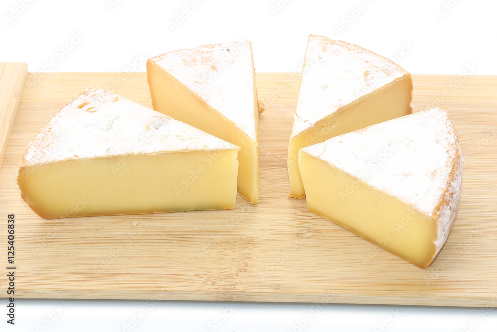 Portions de fromage Photos | Adobe Stock