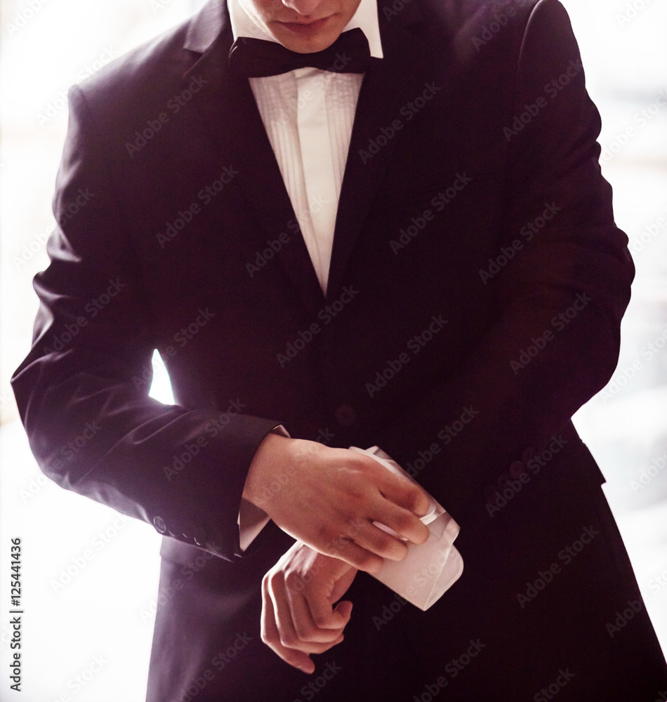 elegant groom Stock Photo | Adobe Stock