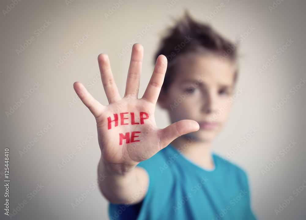 Little boy asking for help foto de Stock | Adobe Stock