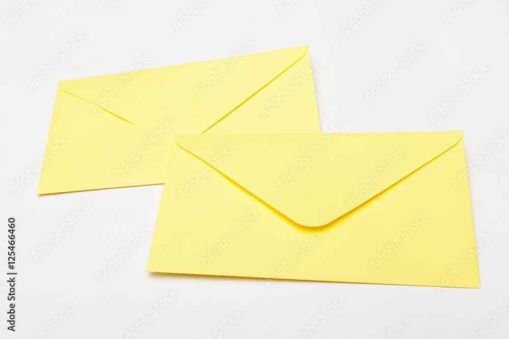 yellow letter envelopes on white backgrounds Stock Photo | Adobe Stock