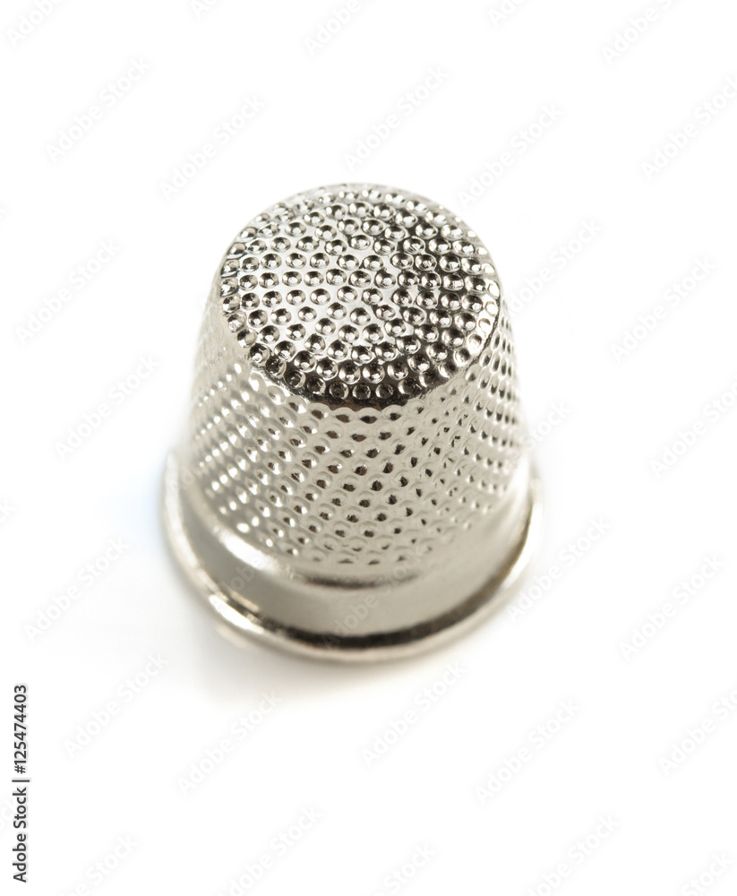 sewing thimble on white Stock Photo | Adobe Stock