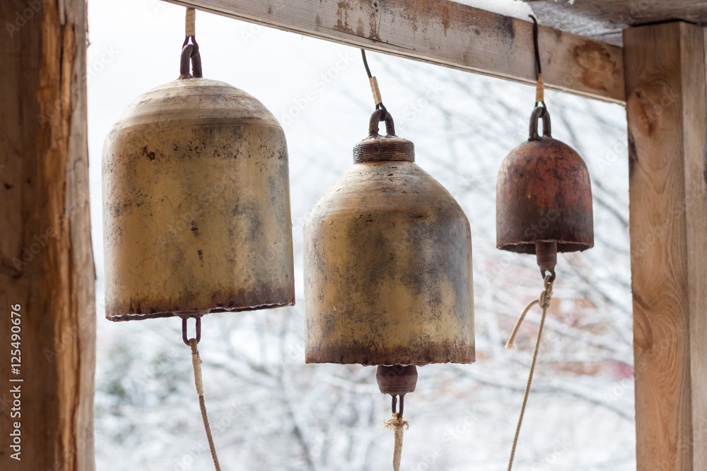 Fotografia do Stock: Three home-made church bells from a gas cylinder ...