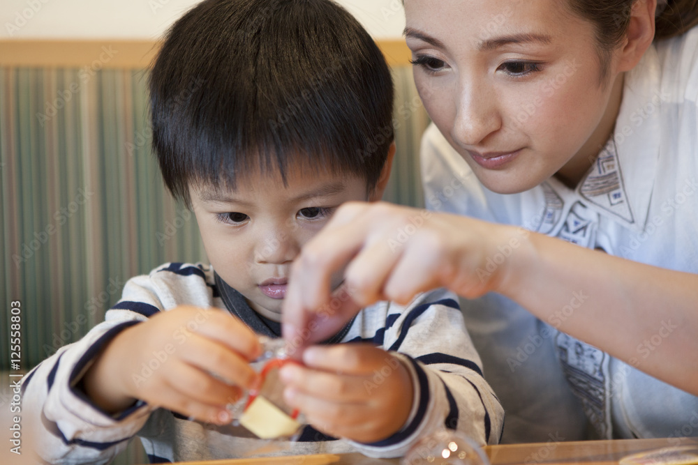 Working together in parent and child Stock Photo | Adobe Stock
