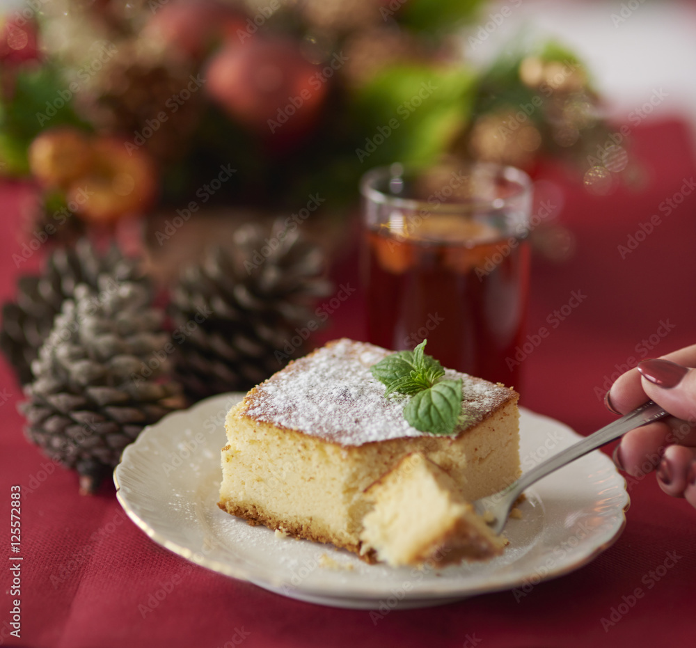 Cutting a piece of traditional cheesecake Stock Photo | Adobe Stock