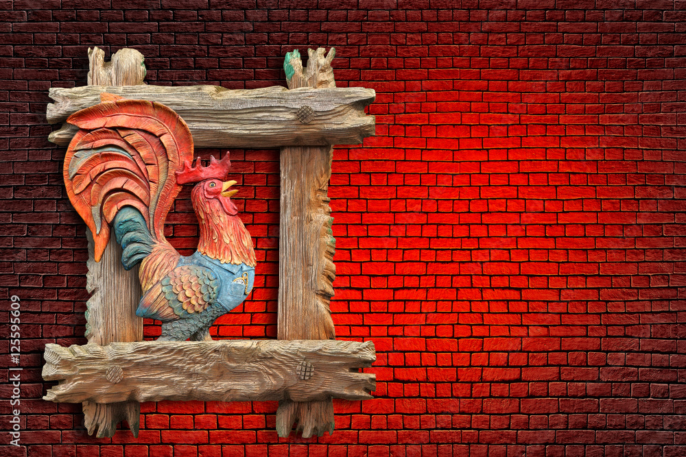 Foto Stock Red fiery rooster in the wooden window frame. Symbol Eastern ...