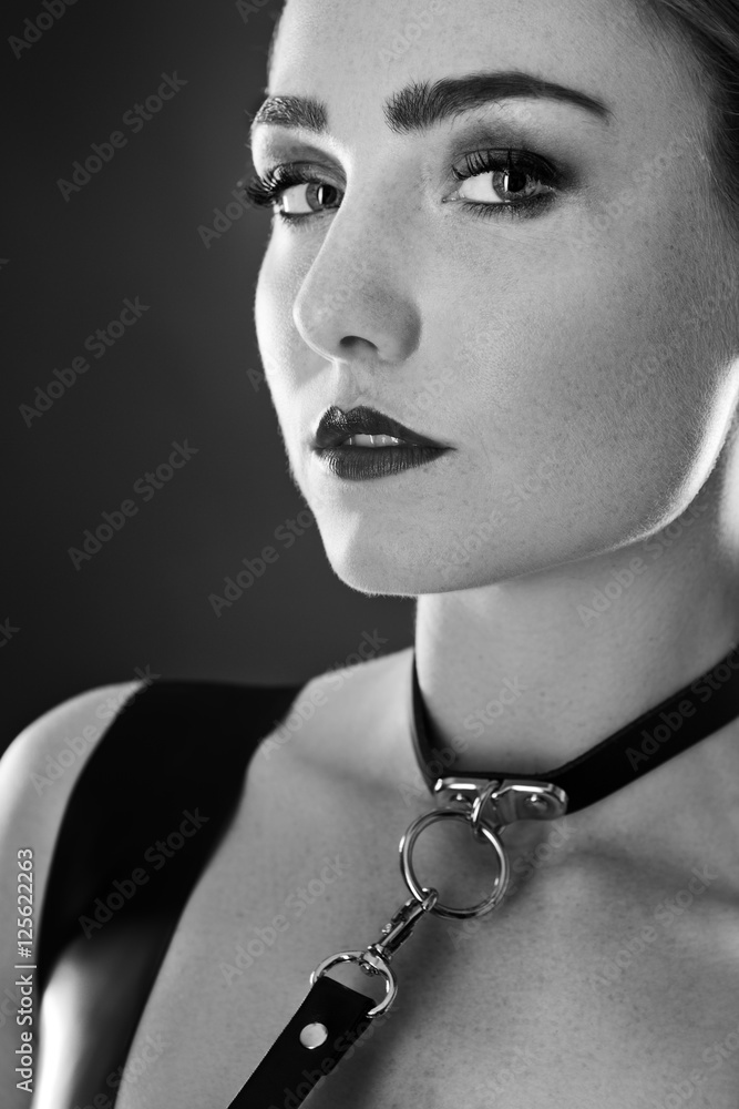 Foto Stock Woman Wearing Latex Adobe Stock
