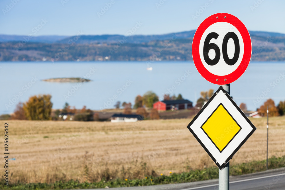 Main road and speed limit road signs Stock Photo | Adobe Stock