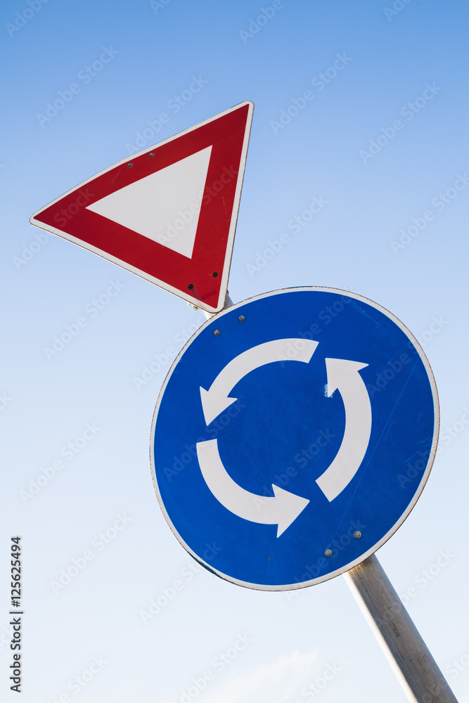 Give way and Traffic roundabout signs Stock Photo | Adobe Stock