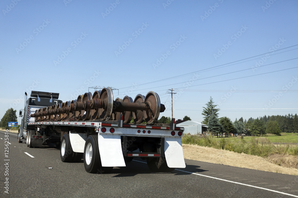 Flatbed Semi Transporting Train Wheels Stock Photo | Adobe Stock