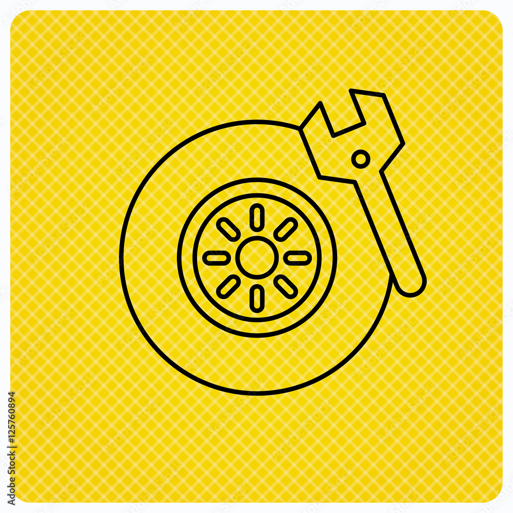 Tire service icon. Wheel and wrench key sign. Linear icon on orange ...