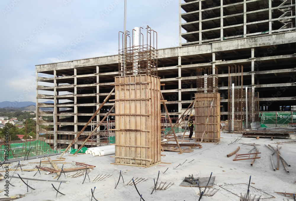 Column timber form work and reinforcement bar at the construction site ...