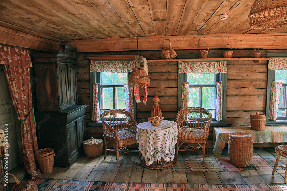 traditional interior of old Russian log village house of 19th ce ...