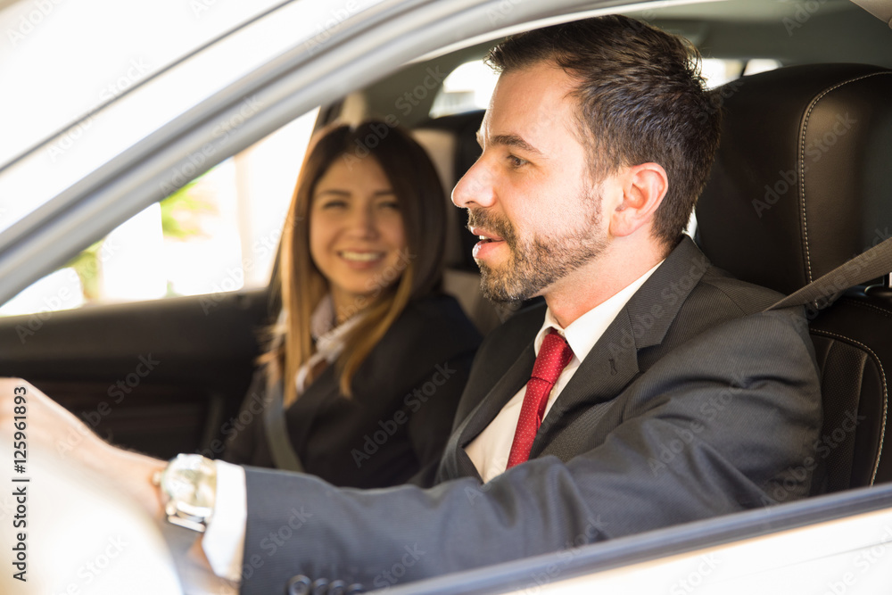 Business colleagues driving a car Stock Photo | Adobe Stock