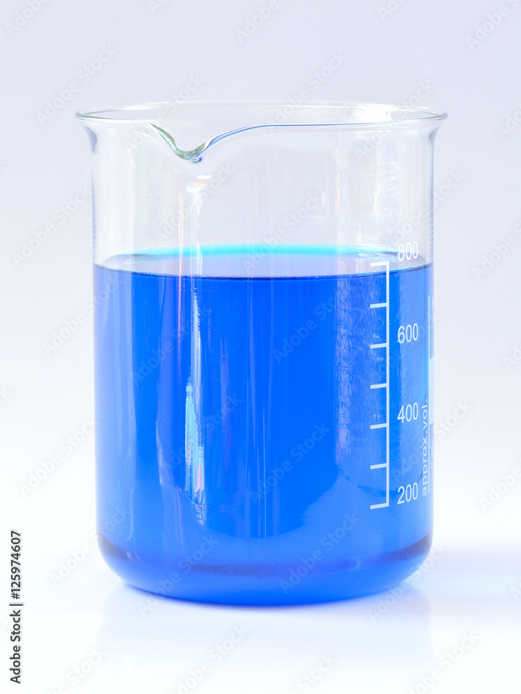 Chemical beaker with blue chemicals dissolved in water Stock Photo ...