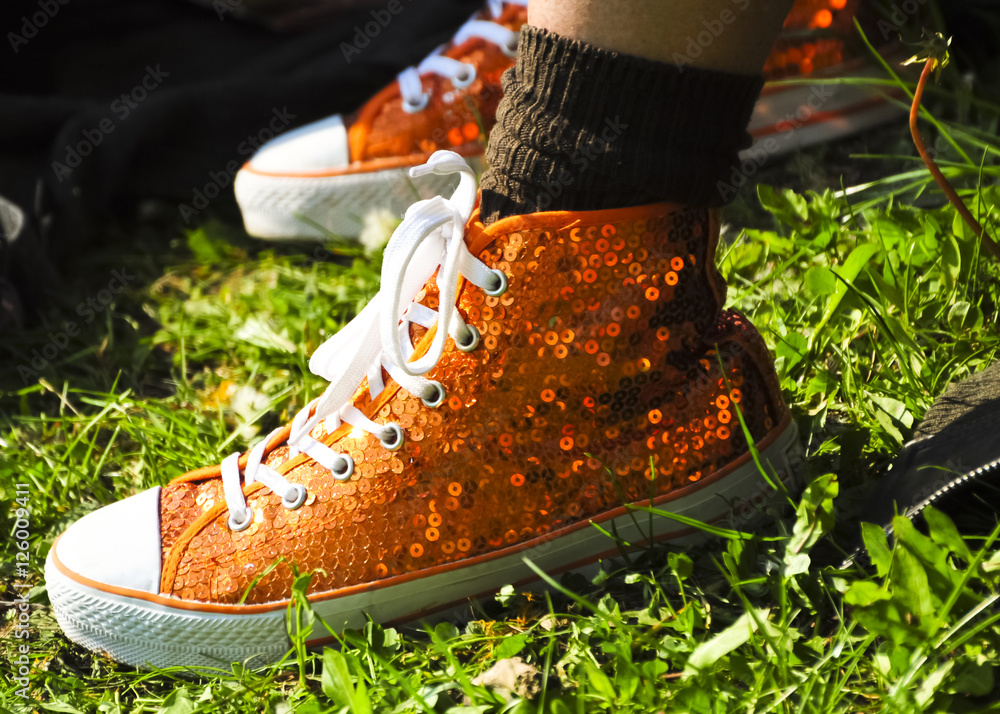 glittering orange shoe Stock Photo | Adobe Stock