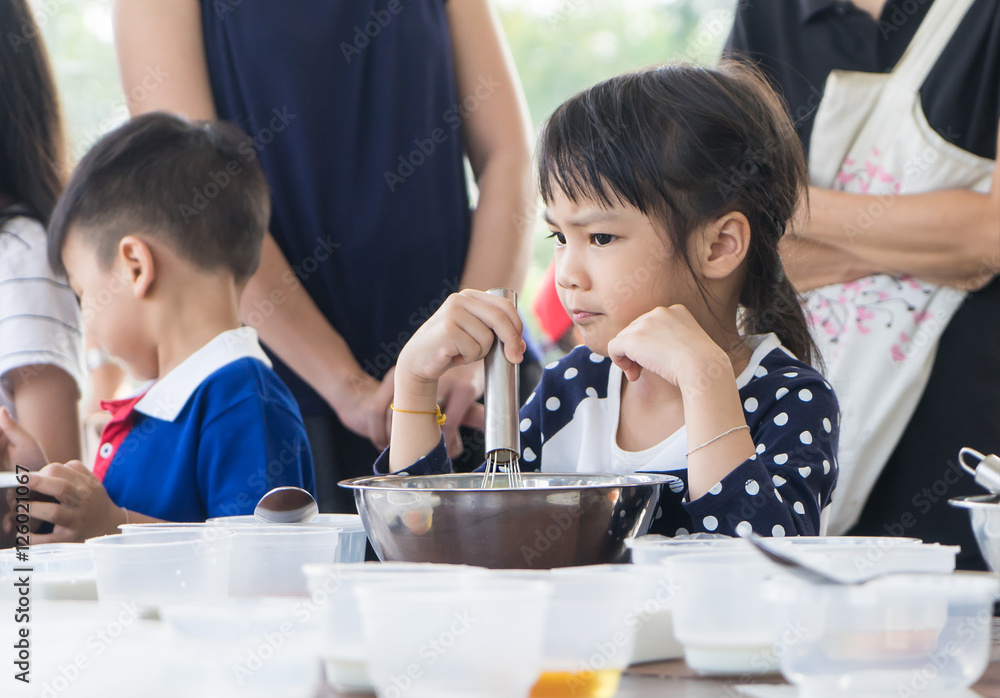 Asian Child are learning cooking in an educational cooking class. Stock ...